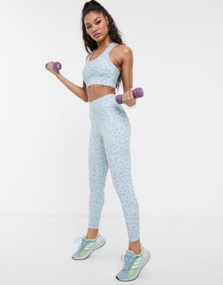 ASOS 4505 – Pastellfarbener, gepunkteter BH mit Racerback und Leggings ...
