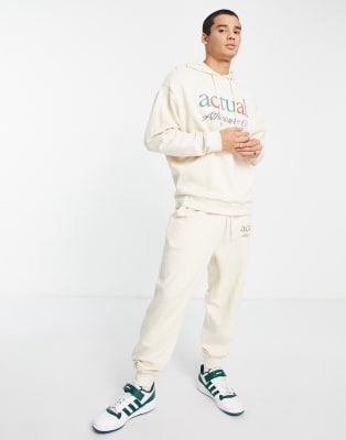 ASOS Actual relaxed set with multi colour logo print in cream | ASOS