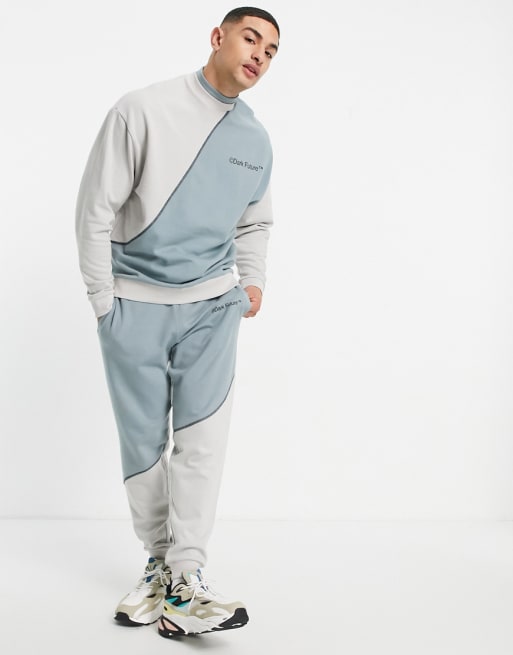 ASOS Dark Future co-ord with curved cut and sew with logo print in grey ...