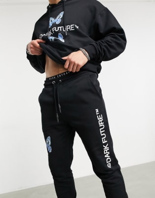 ASOS Dark Future set with butterfly logo in black | ASOS