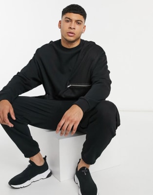 ASOS DESIGN co-ord tracksuit with mesh utility pockets in black | ASOS