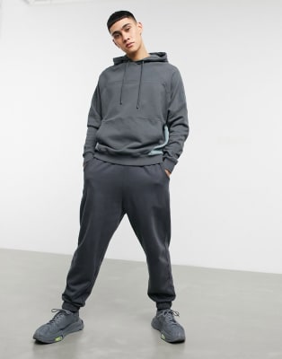 ASOS DESIGN oversized tracksuit with rib inserts in washed black | ASOS