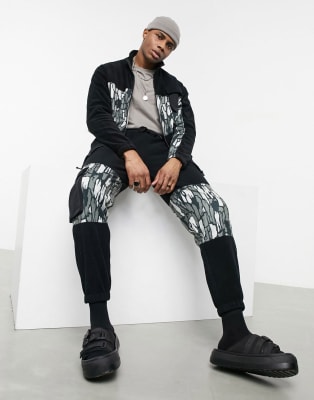 ASOS DESIGN tracksuit set with abstract camo panels | ASOS