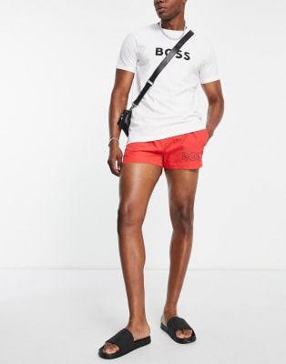 BOSS Swimwear Mooneye large logo shorter length swim shorts in red ...