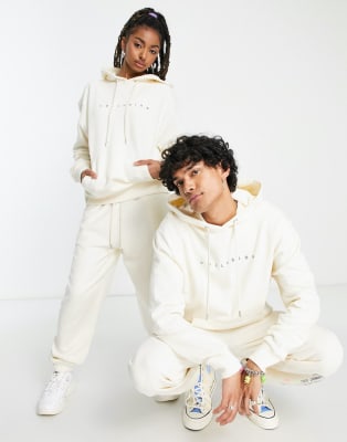 COLLUSION Unisex hoodie and trackies set with text print in ecru | ASOS