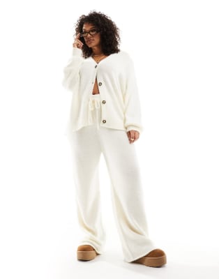 In The Style Plus fluffy cardigan and flare pants set in cream | ASOS