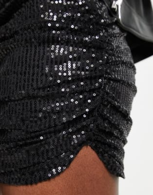 NaaNaa - Ensemble avec crop top à sequins et col bénitier et mini-jupe froncée - Noir | ASOS