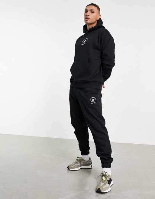 New Balance life in balance joggers, hoodie and t-shirt in black | ASOS