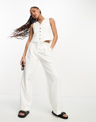 Pieces sleeveless waistcoat and pleat front trouser co-ord in white | ASOS