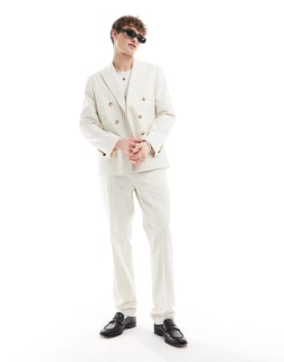 Traje color crema con doble botonadura y raya diplomática de Twisted ...