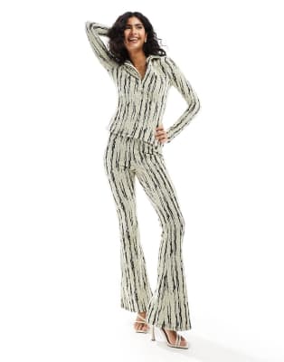 Vero Moda textured zip front top and flare pants set in monochrome | ASOS