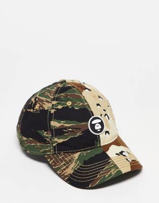 AAPE logo cap in half and half camo print | ASOS