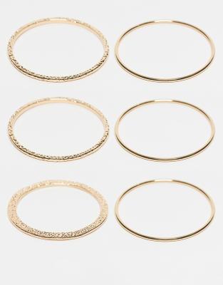 Accessorize 6 pack mixed bangles in gold | ASOS