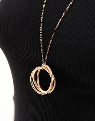 Accessorize long circle pendant necklace in gold