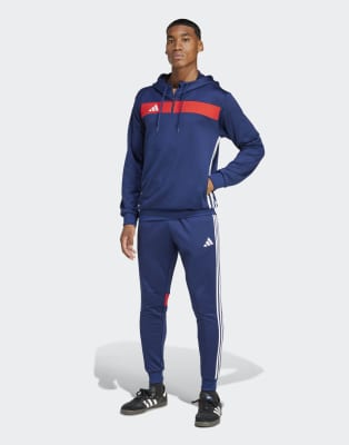 adidas Football Tiro 25 essentials sweat pants in team navy / red | ASOS