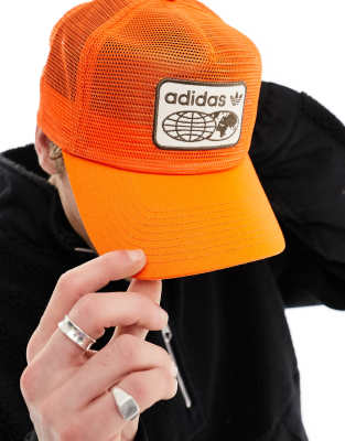 adidas Original Worldwide Full Mesh trucker hat in orange | ASOS