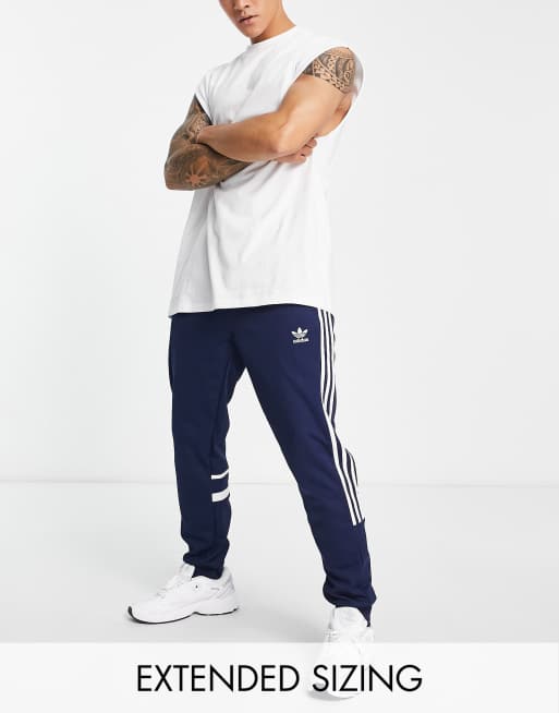 adidas Originals Adicolor Classics slim trackies in blue | ASOS