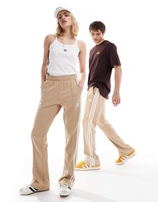 adidas Originals Adicolor flare tracksuit bottoms in beige | ASOS