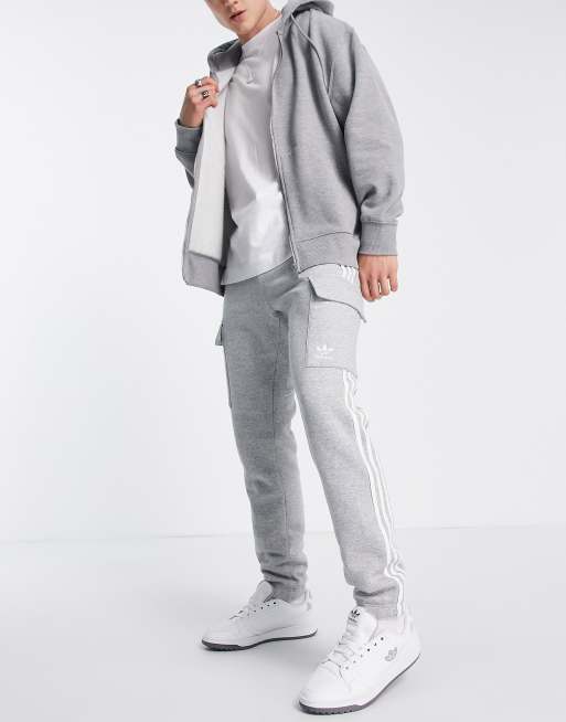 adidas Originals adicolor three stripe cargo trackies in grey | ASOS
