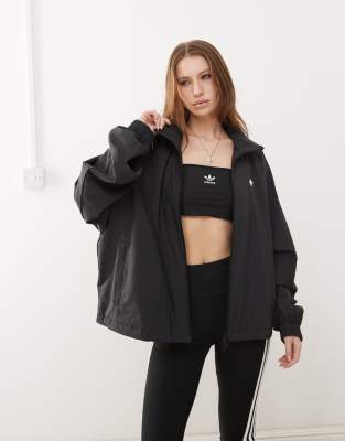 adidas Originals Adilenium Season 3 woven track top in black | ASOS