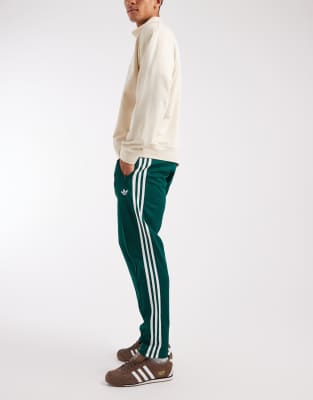 adidas Originals Classic track pants in collegiate green/white | ASOS