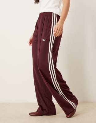 adidas Originals Firebird Loose track pants in burgundy | ASOS