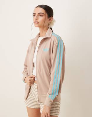 adidas Originals - Firebird - Top della tuta largo beige e blu | ASOS