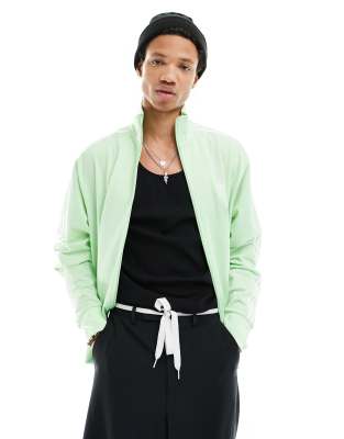 adidas Originals Firebird track jacket in pastel green | ASOS