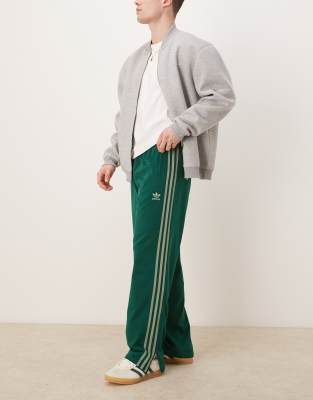 adidas Originals Firebird track pants in green | ASOS