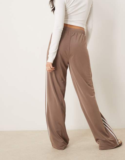 adidas Originals Firebird track pants in light brown | ASOS