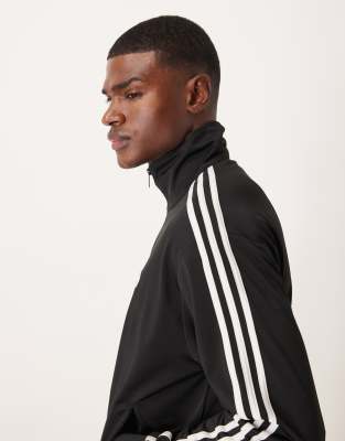 adidas Originals Firebird track top in black | ASOS