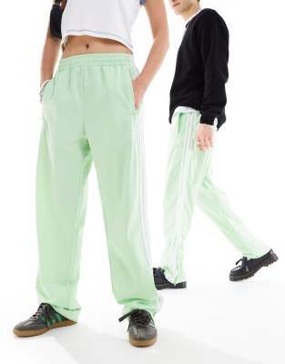 adidas Originals Firebird unisex track pants in pastel green | ASOS