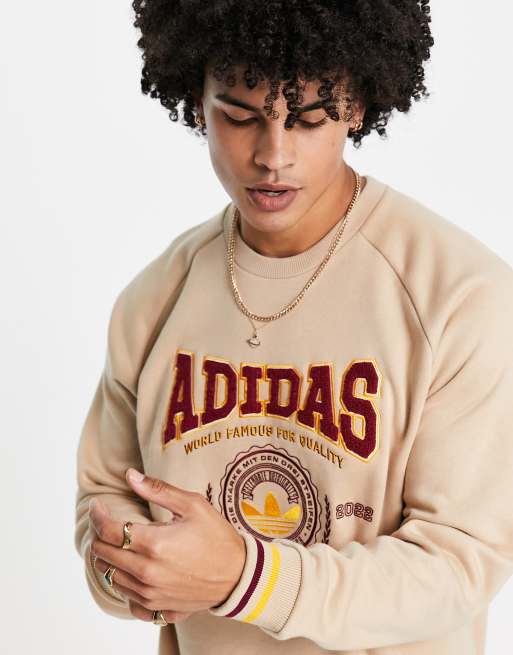 adidas Originals 'Preppy Varsity' large logo sweatshirt in beige | ASOS