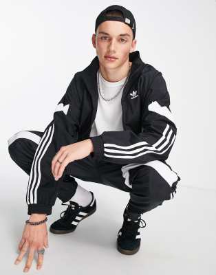adidas Originals Rekive 3 stripe logo full zip jacket in black | ASOS