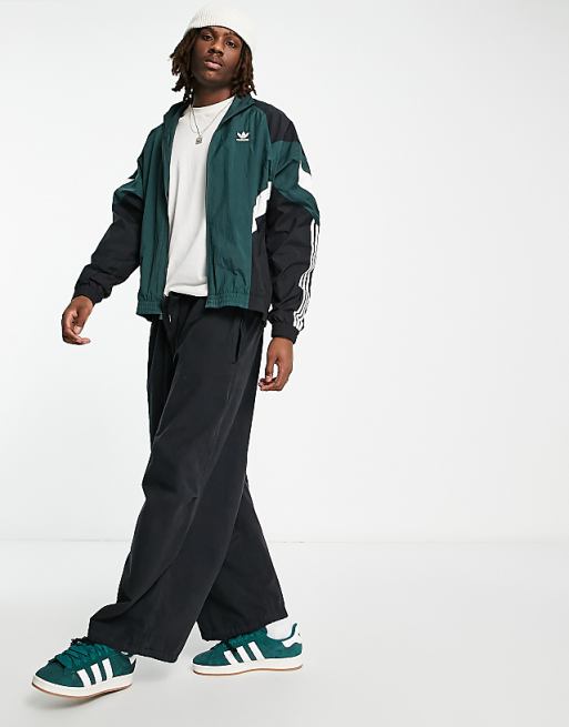 adidas Originals Rekive graphic detail woven track top in adidas Originals Rekive graphic detail woven track top in