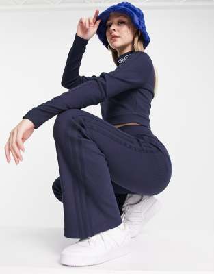 adidas Originals 'Retro Luxury' ribbed flared pant in deep navy | ASOS