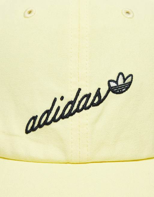 adidas Originals script logo cap in yellow | ASOS