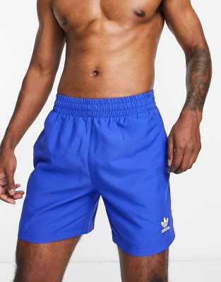 adidas Originals Swimwear Solid shorts in blue | ASOS