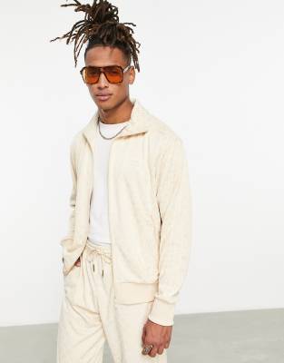 adidas Originas Trefoil monogram tracktop in neutral | ASOS