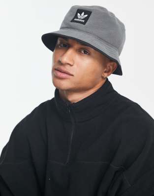 adidas Originlas reversible fleece Bucket hat in gray and black | ASOS