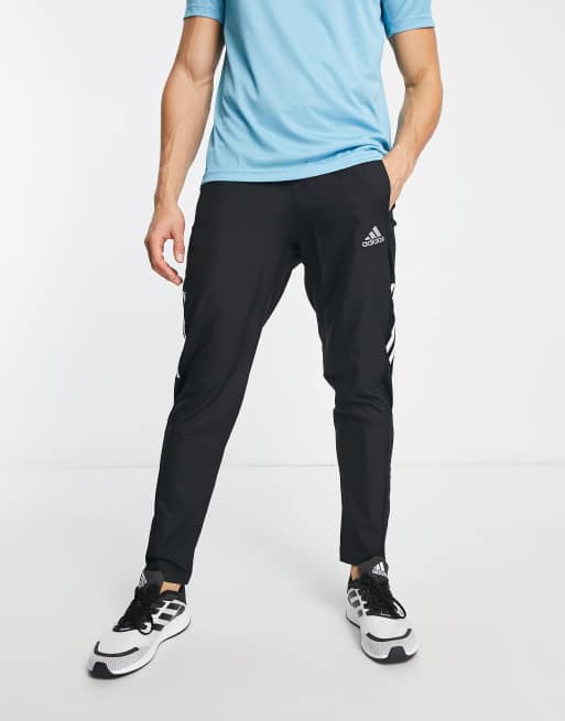 adidas Running Astro trackies in black | ASOS