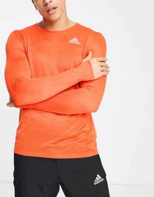 adidas Running Own The Run long sleeve t-shirt in orange | ASOS