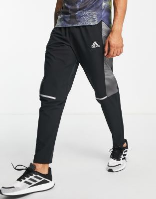 adidas Running Own the Run panel trackies in black | ASOS
