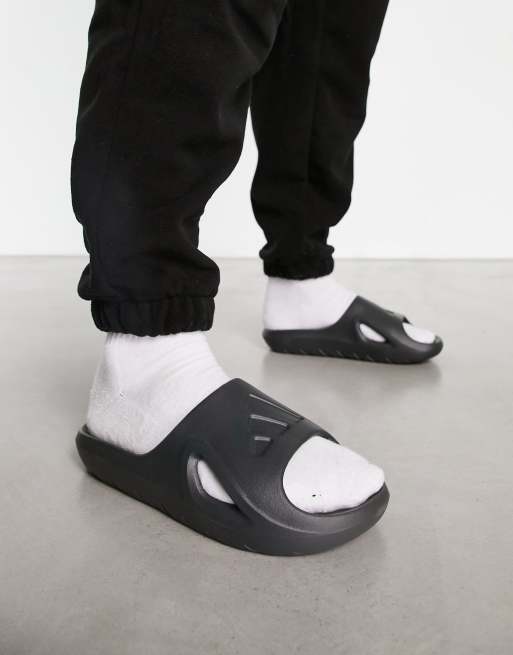 adidas Sportswear - Adicane - Slippers in neutraal zwart | ASOS