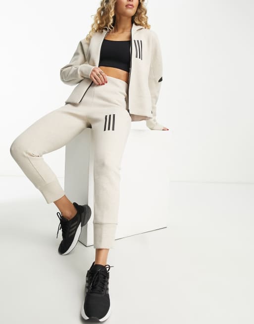 adidas Sportswear Mission Victory trackies in off white | ASOS