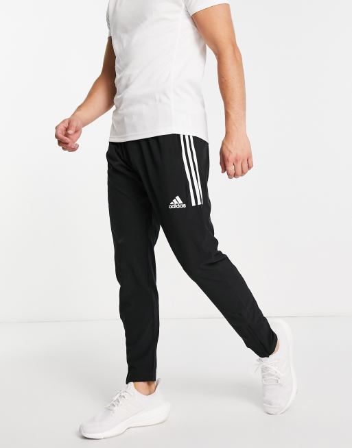 adidas Training trackies with three stripes in black | ASOS