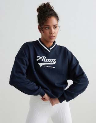 Aim'n Navy pitch v-neck sweatshirt in blue | ASOS