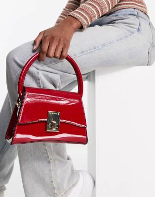 ALDO Angelie top handle mini bag with chain crossbody strap in red ...