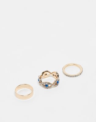 ALDO multi 3 pack of rings with eye and glass stone detail in gold | ASOS