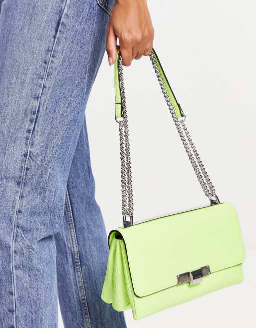 ALDO Schema crossbody bag with monogram in lime | ASOS